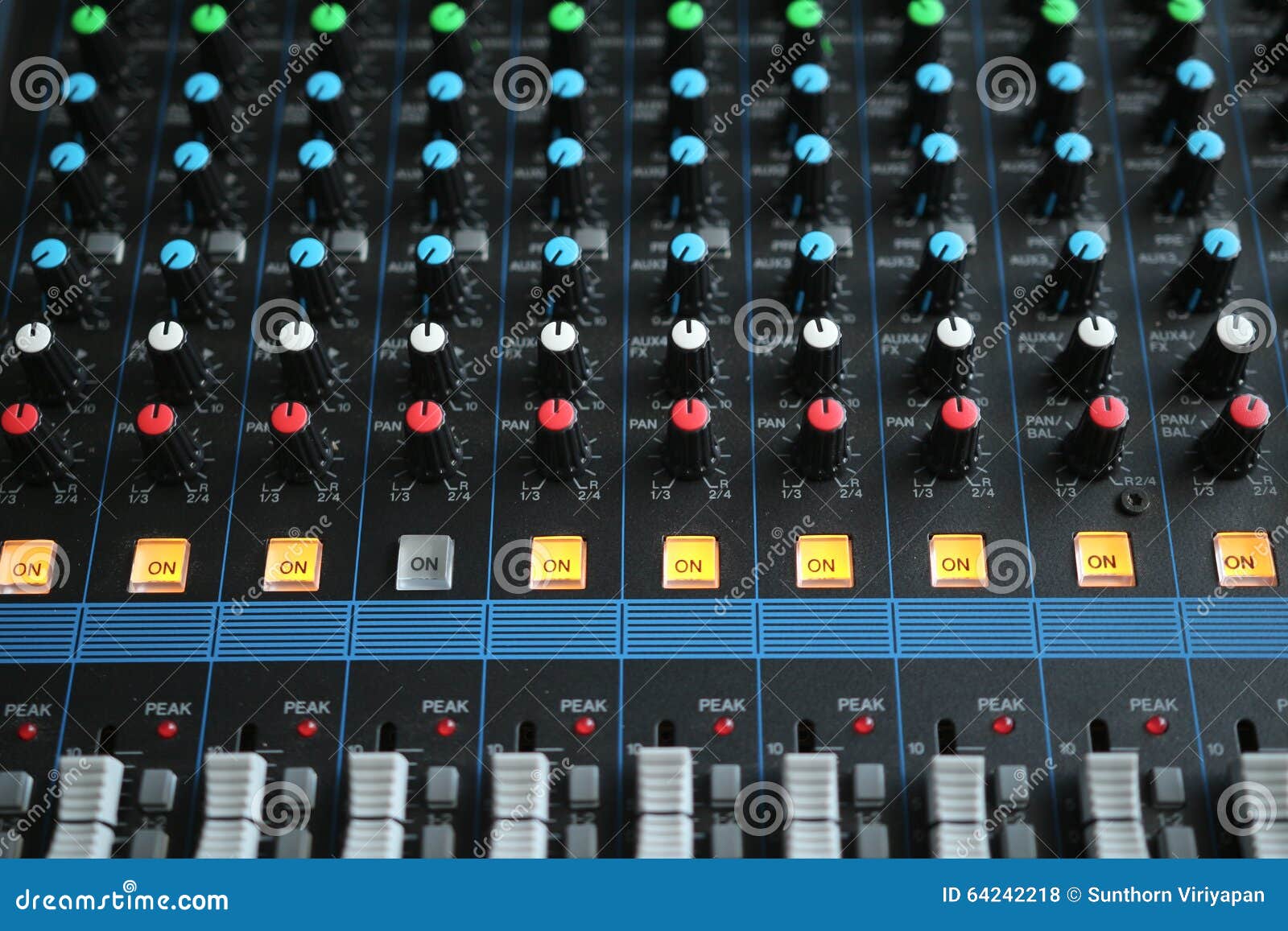 Close Up of the Rows of Knobs and Sliders on an Analogue Mixing Stock ...