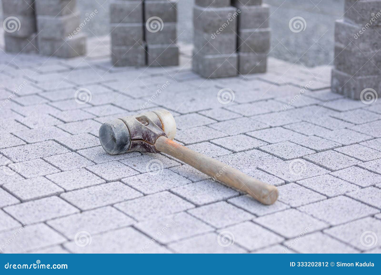 Close Up of a Rubber Mallet on the New Concrete Pavement, Building a ...