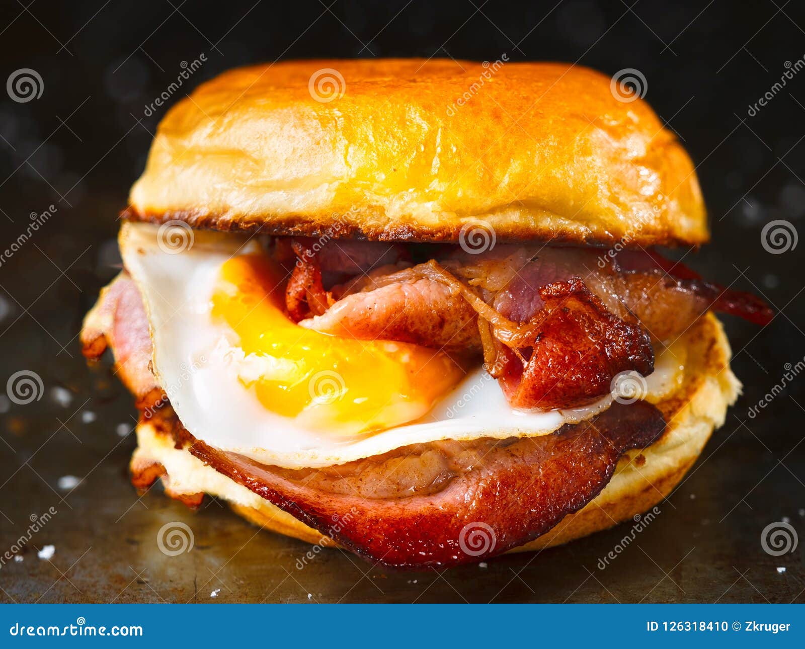 Rustic Bacon Egg Breakfast Sandwich Bun Stock Photo - Image of salty ...