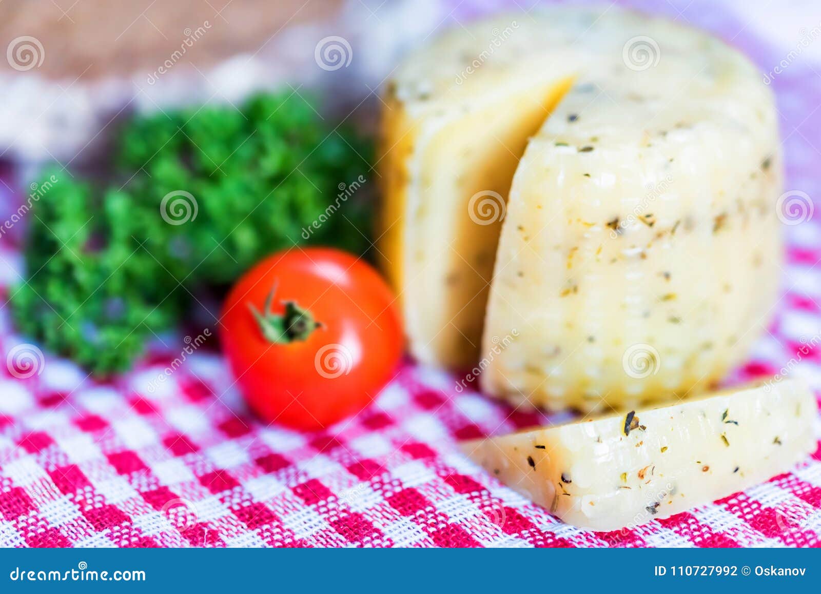 Rustic Cheese with Herbs and Tomatoes Stock Photo - Image of background ...