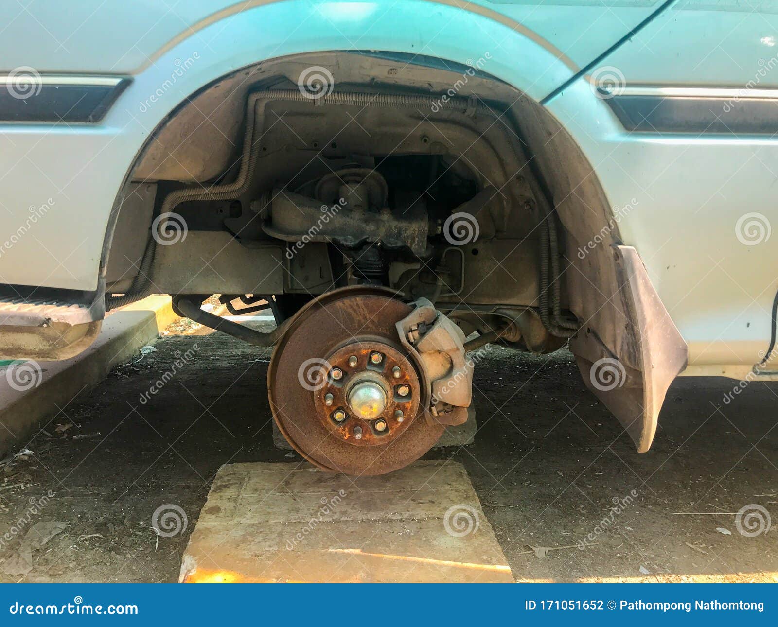 Rusty Broken Car with Missing Wheel Stock Photo - Image of doors ...