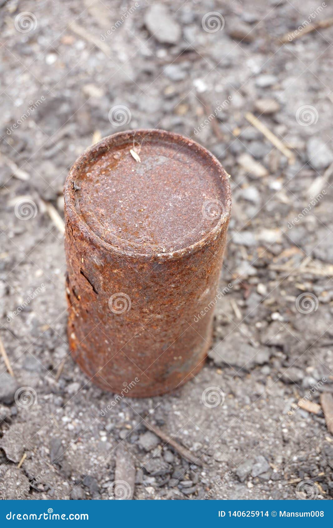 Rusty can on the ground stock photo. Image of recycling - 140625914