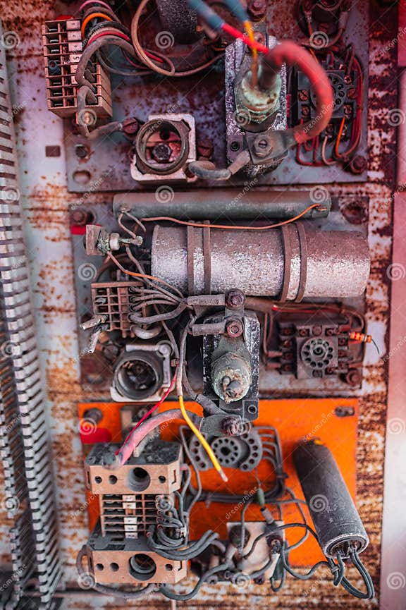 Close-Up of a Rusty Industrial Electrical Panel with Wires and ...
