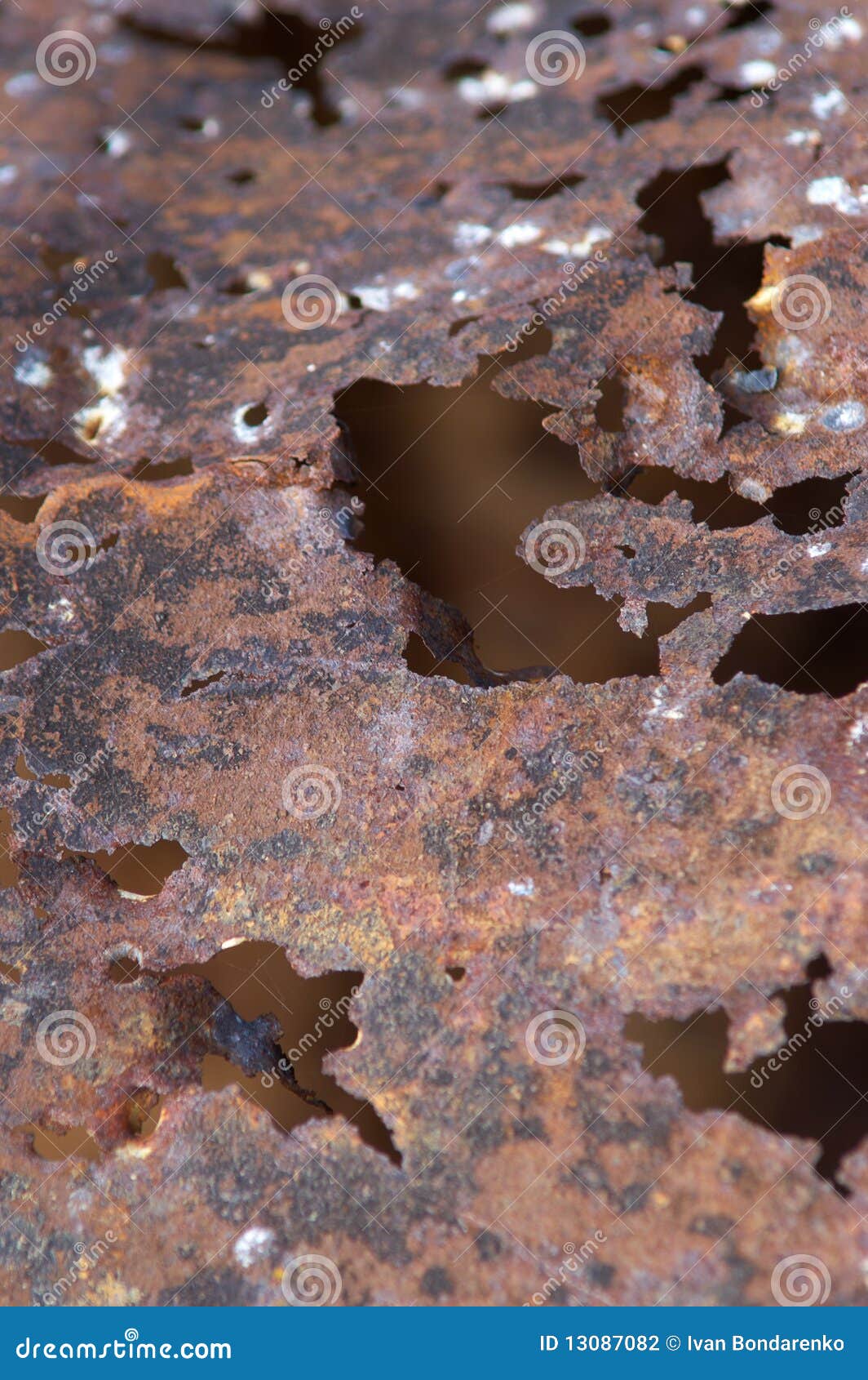 Close Up of Rusty Piece of Iron Full of Holes Stock Photo - Image of ...