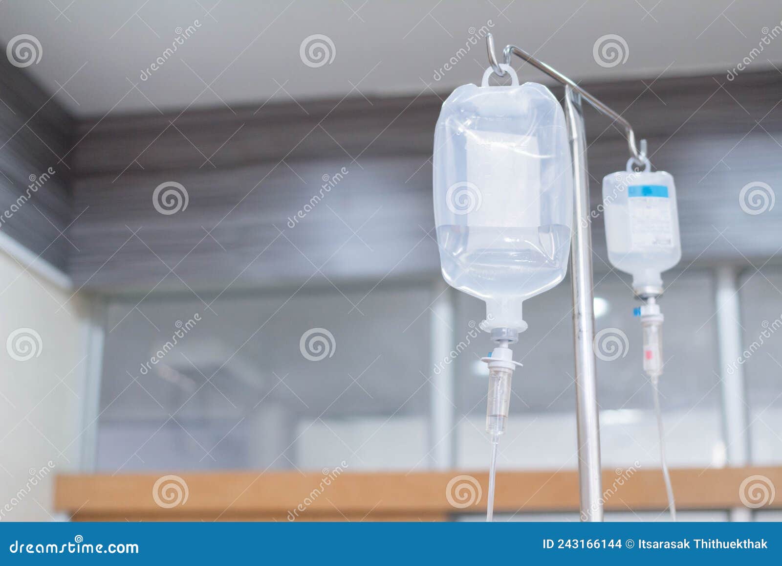 Close Up Saline Solution Drip for Patient Stock Photo - Image of ...