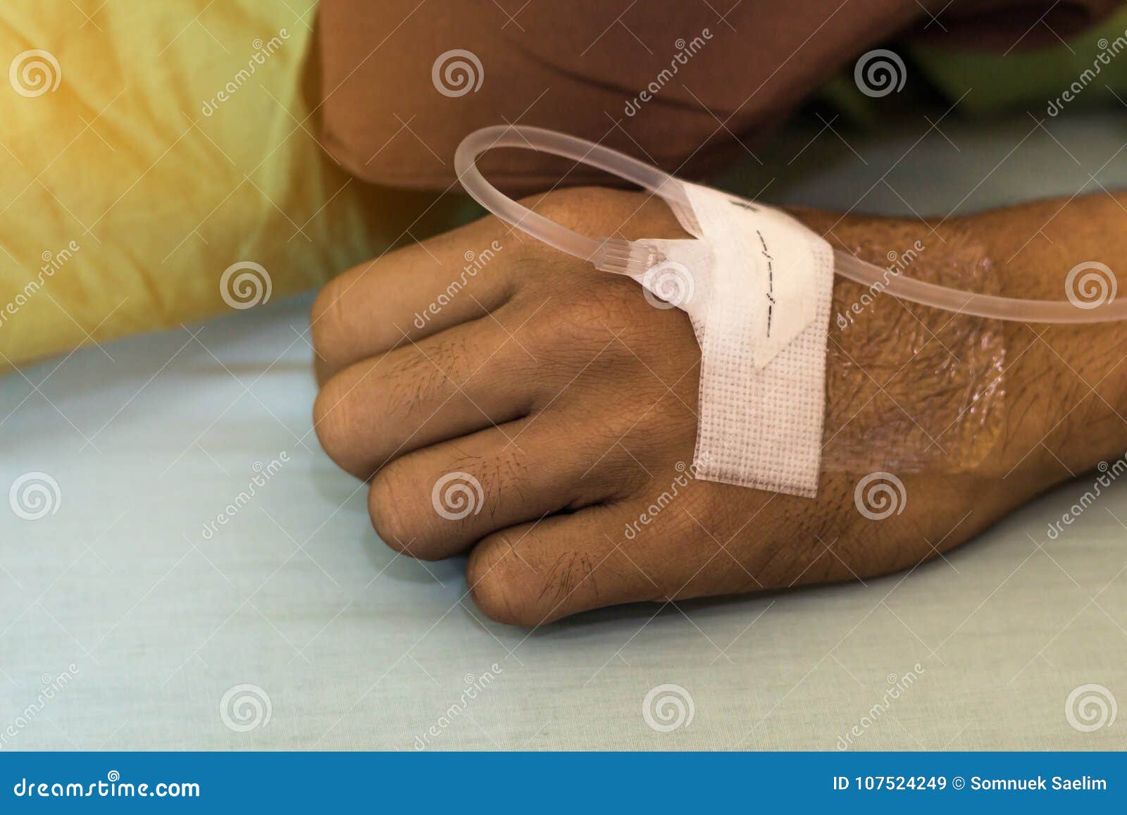 Close Up of Saline Solution on Hand of Man Patient Lying on the Stock ...