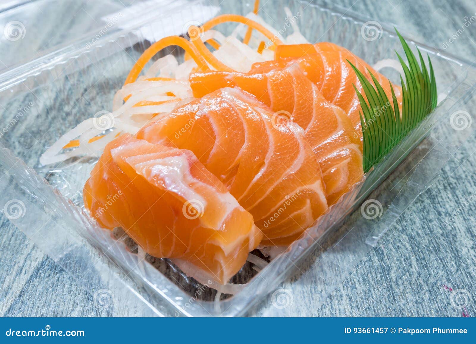 Close Up of Salmon Raw Sashimi Pack in Clear Plastic Box on Wooden ...