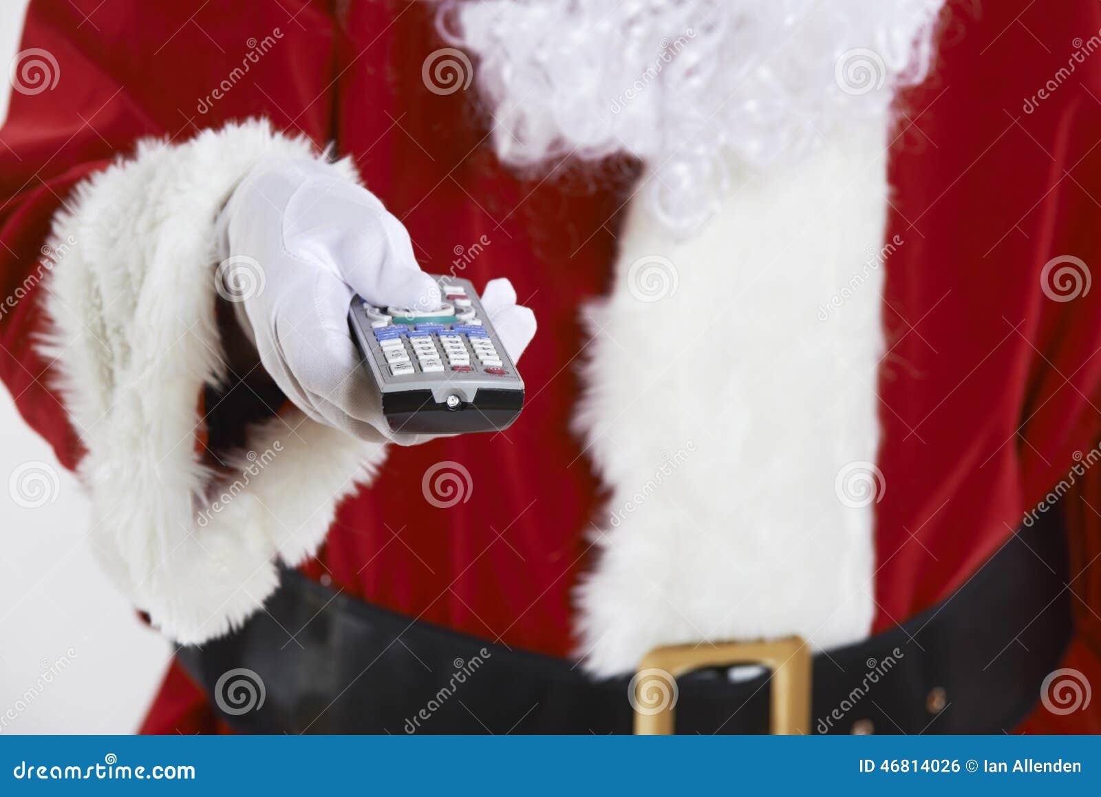 Close Up of Santa Claus Holding Television Remote Control Stock Photo ...