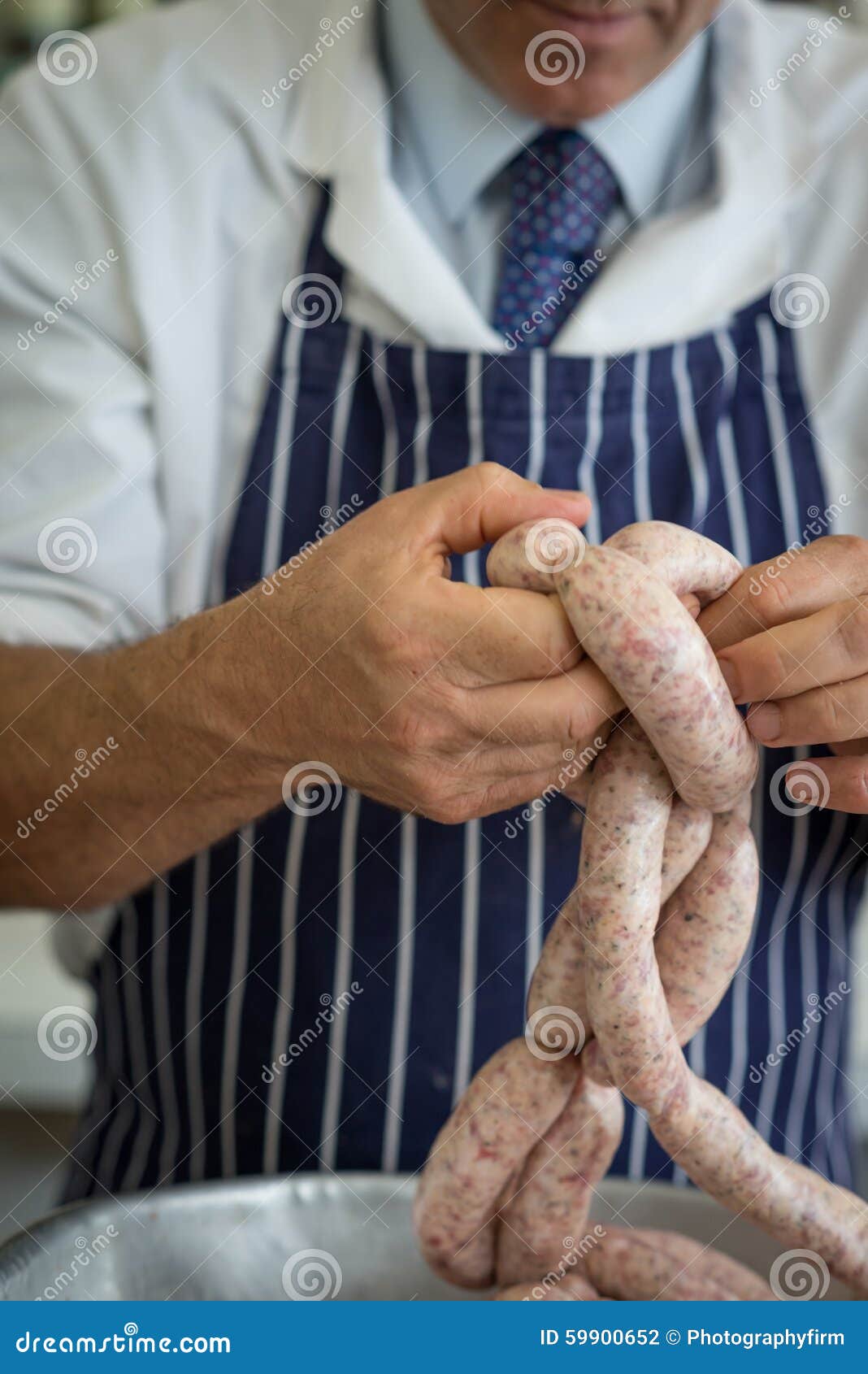 Close Up of Sausage Linking Stock Photo - Image of apron, carve: 59900652