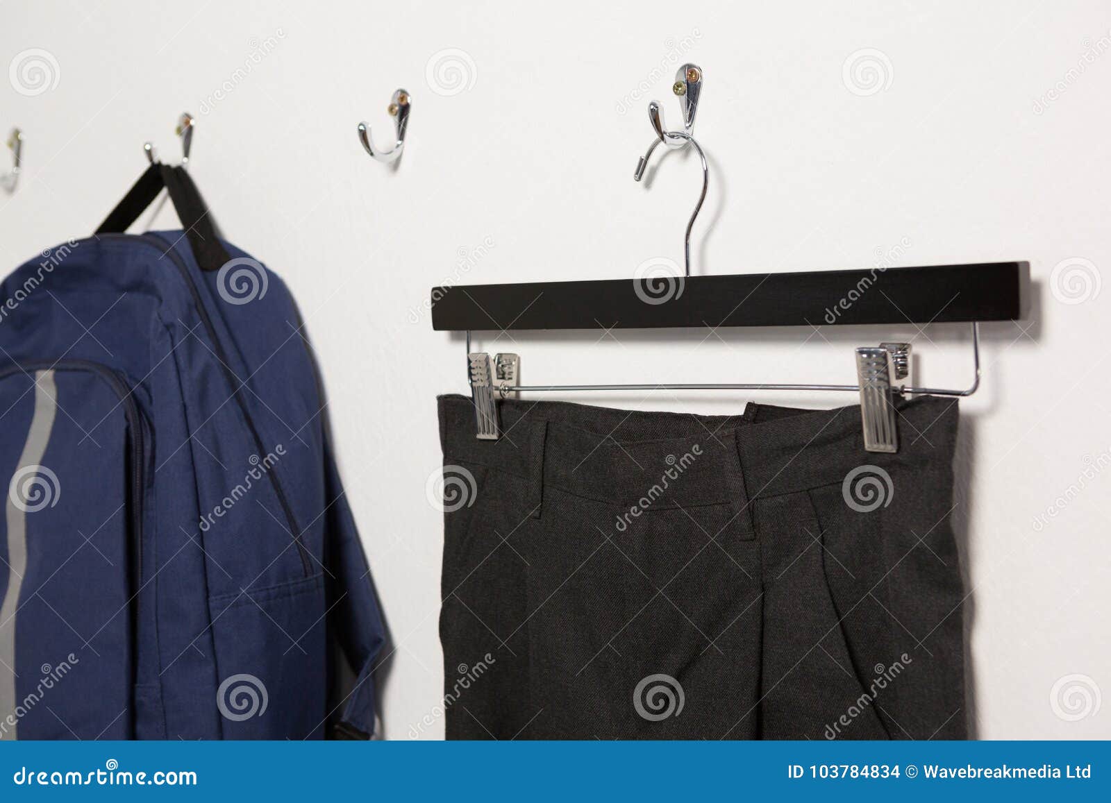 School Uniform and Schoolbag Hanging on Hook Stock Photo - Image of ...