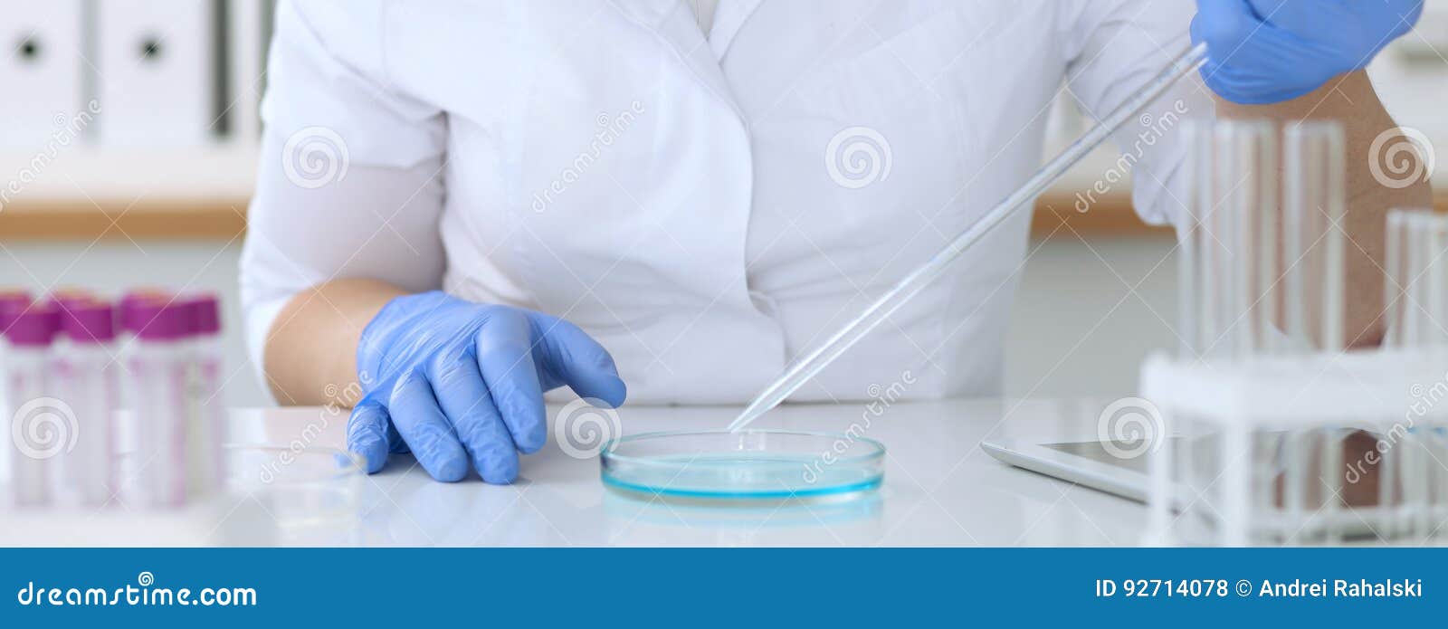 Close Up of Scientific Research Hands with Clear Solution in Laboratory ...