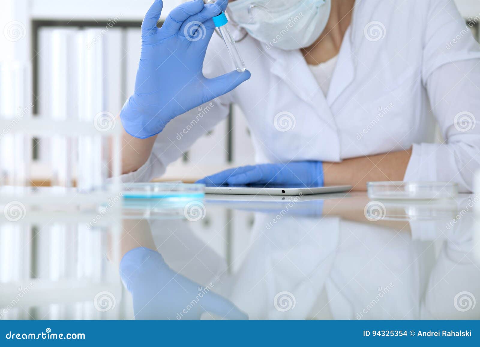 Close Up of Scientific Research Hands with Clear Solution in Laboratory ...