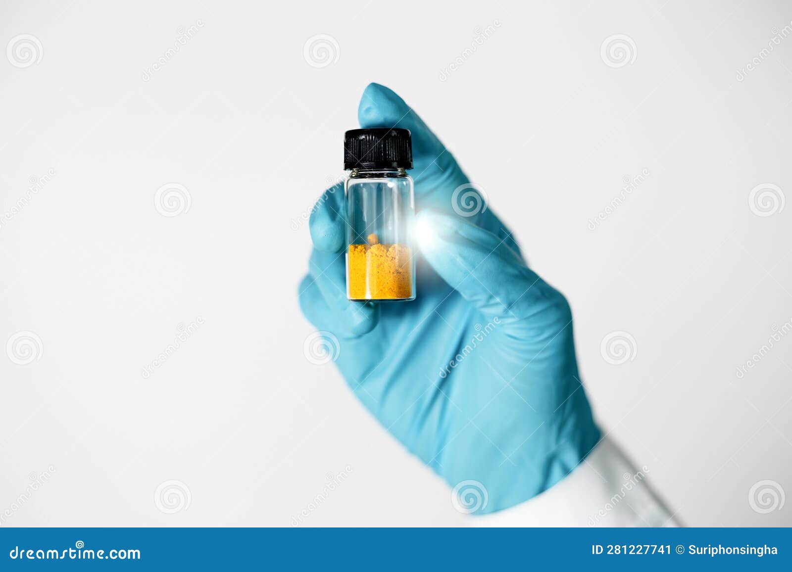 Close Up of Scientist Hand Shows an Orange Solid in Vial Glass of ...