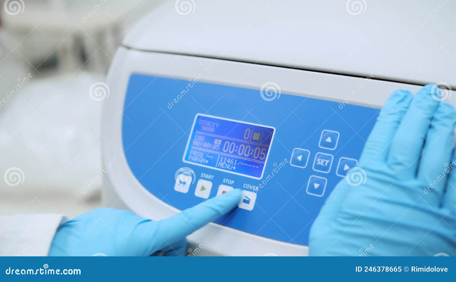 Close Up Scientist Stops the Centrifuge and Opens it Using the Button ...