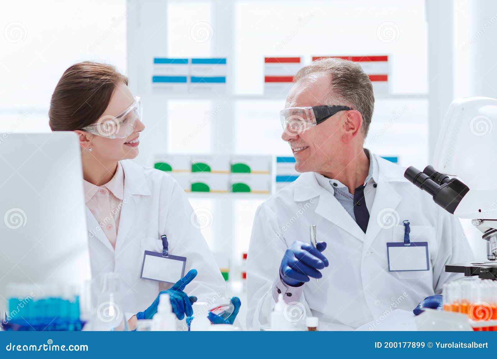 Close Up. Scientists Discussing Samples Sitting at a Laboratory Table ...