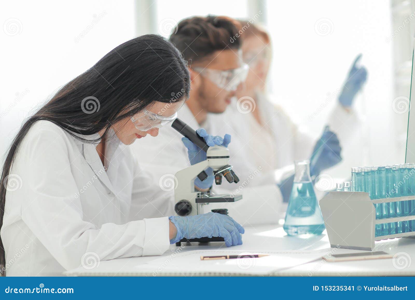 Close Up.scientists and Laboratory Workers Sitting at the Laboratory ...