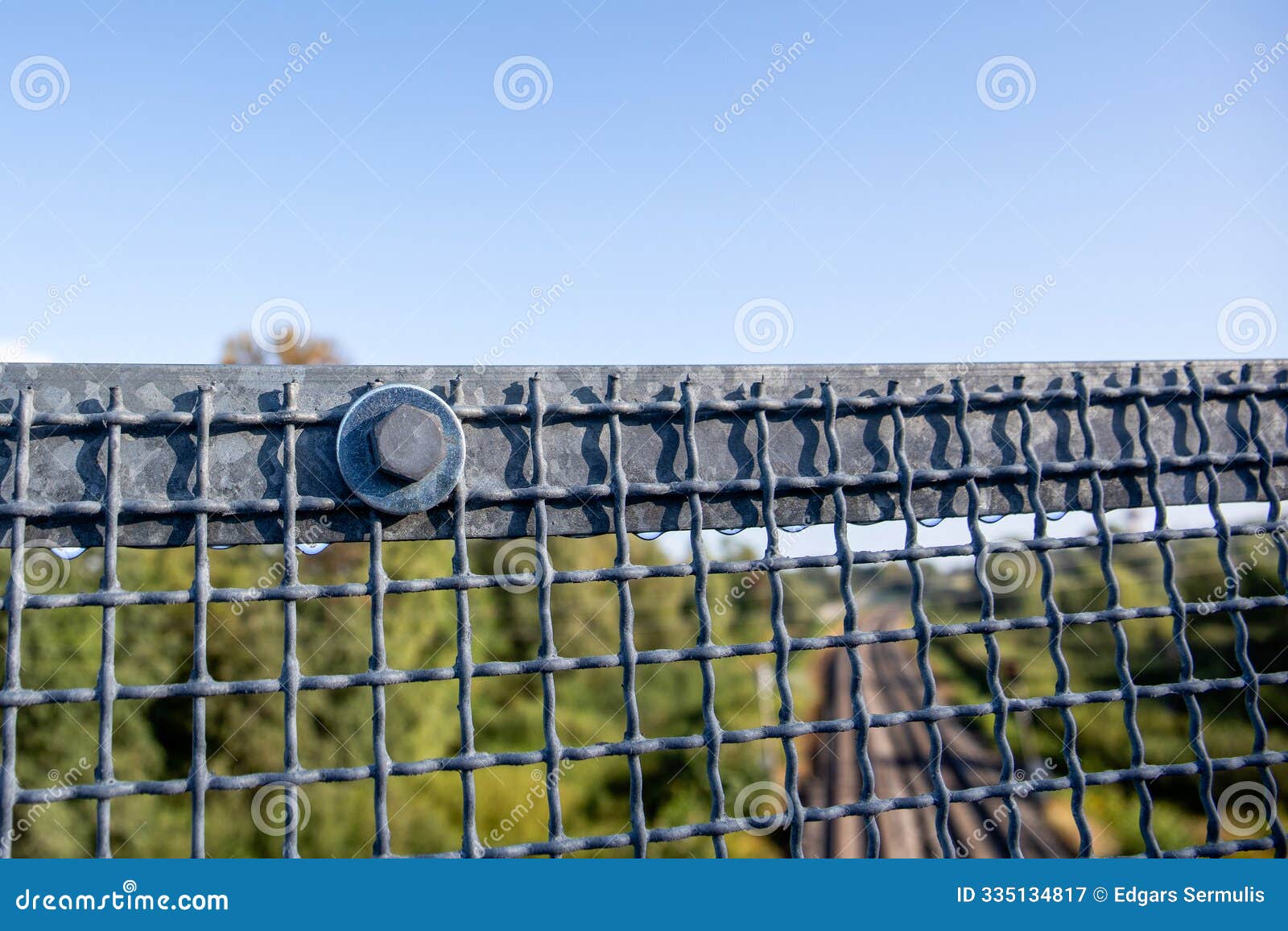 Close-up of of Metal Grating, Railroad in the Background Stock Image ...