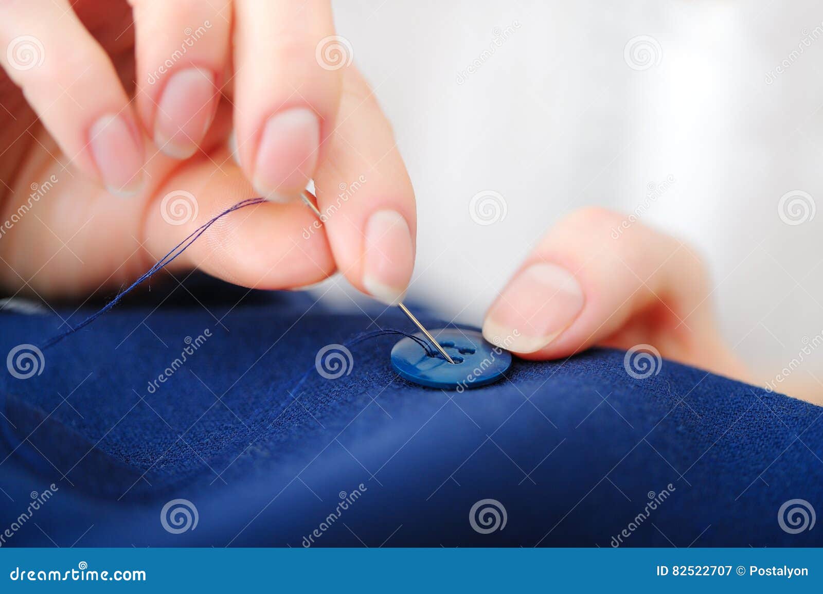Close Up Seamstress Fingers Sewing Button in Workshop. Stock Image ...