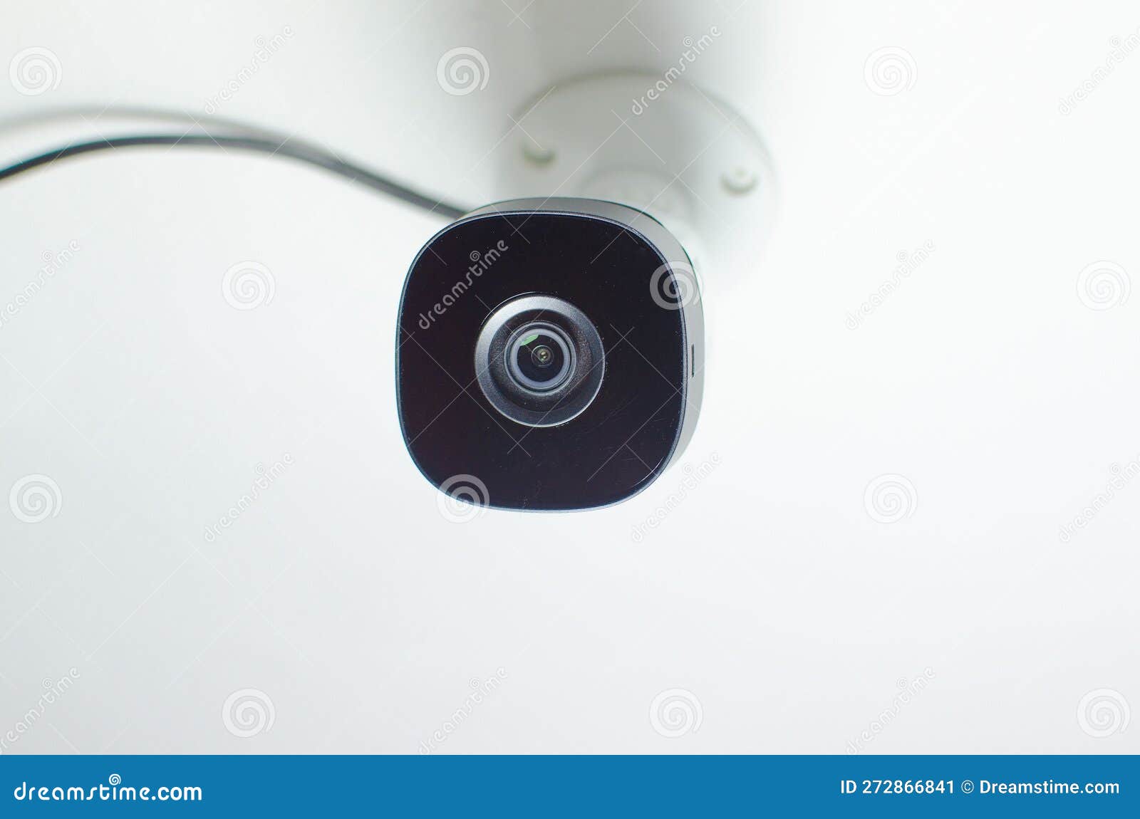 Close-up of a Security Camera Mounted on a Wall in a Modern Office ...