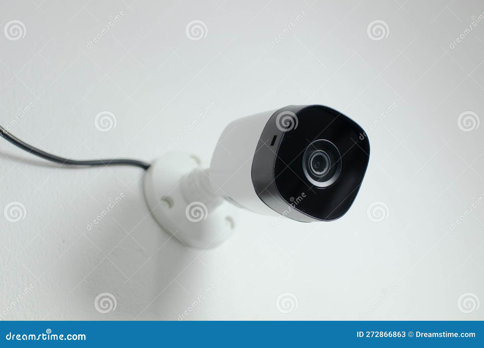 Close-up of a Security Camera Mounted on a Wall in a Modern Office ...