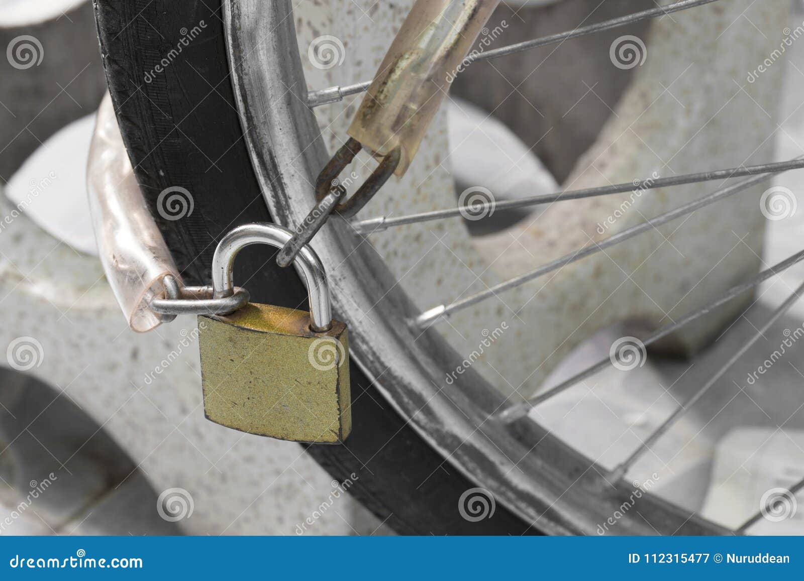 Close - Up of Security Lock Blocking the Bicycle Wheel Stock Image ...