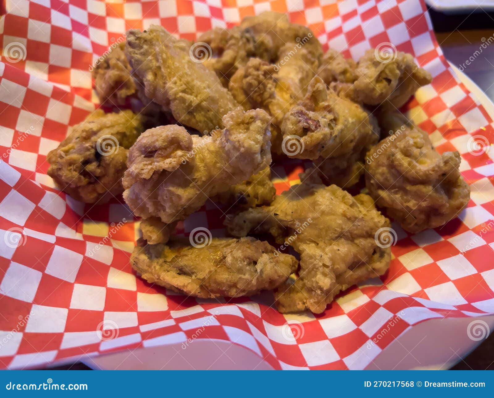Close Up, Selective Focus on Korean Fried Chicken in a Basket with Red ...