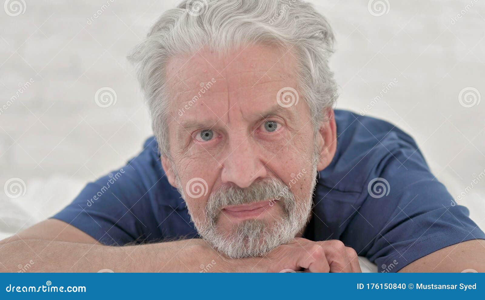 Close Up of Senior Old Man Lying in Bed and Looking at Camera Stock ...