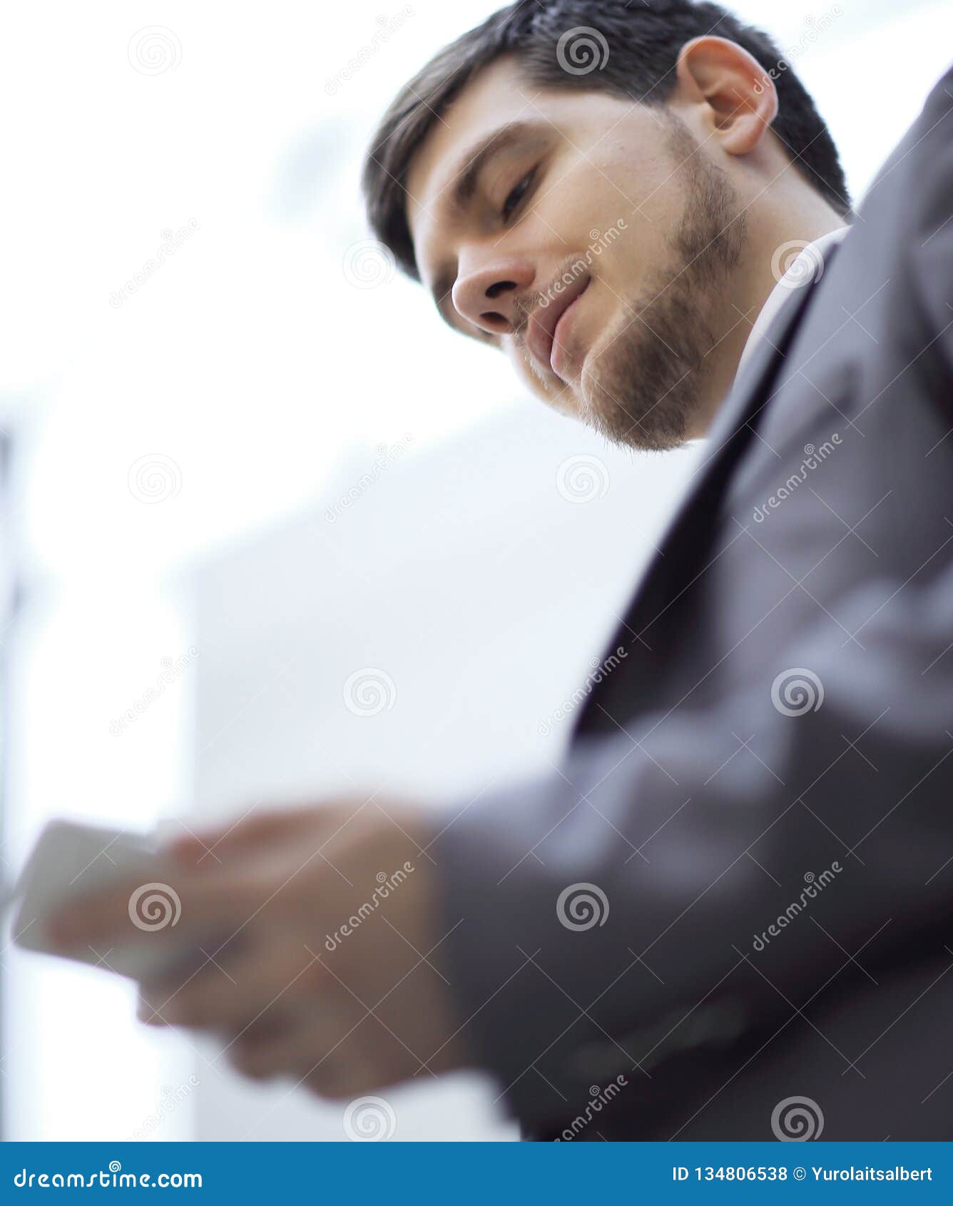 Close Up.serious Businessman Reading Text Message on Smartphone Stock ...