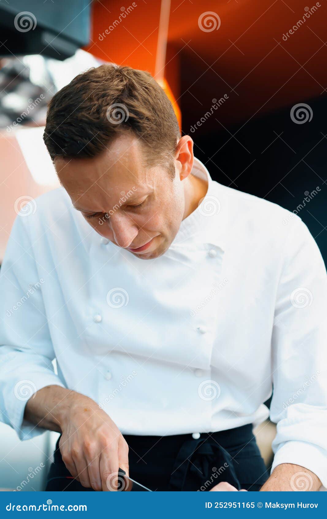 Close-up of a Serious-faced Chef Working in a Professional Restaurant ...