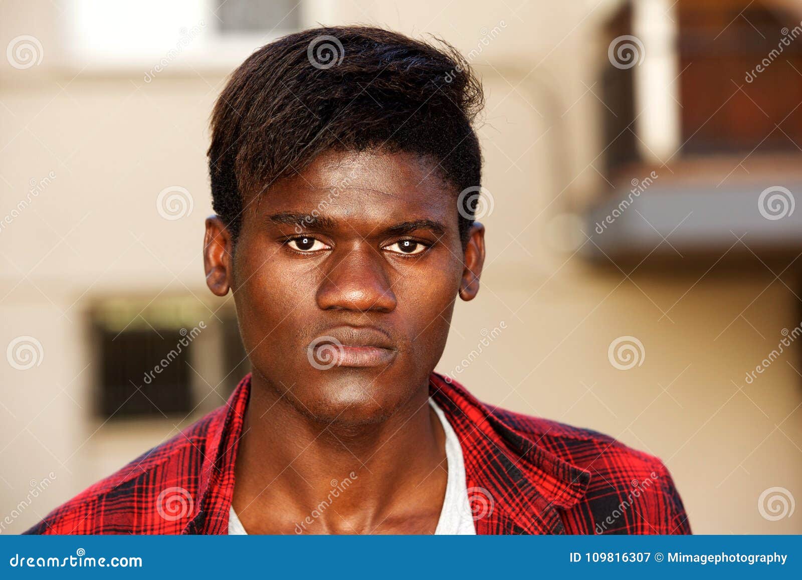 Close Up Serious Young African Man Staring in Front Stock Image - Image ...