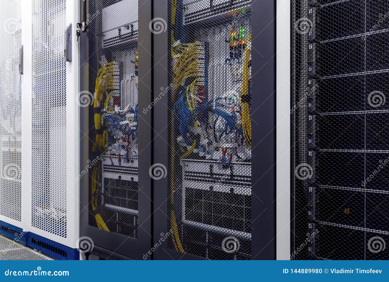 Close Up Server Rack with LED Indicator, Internet Wires, Optic Cables ...