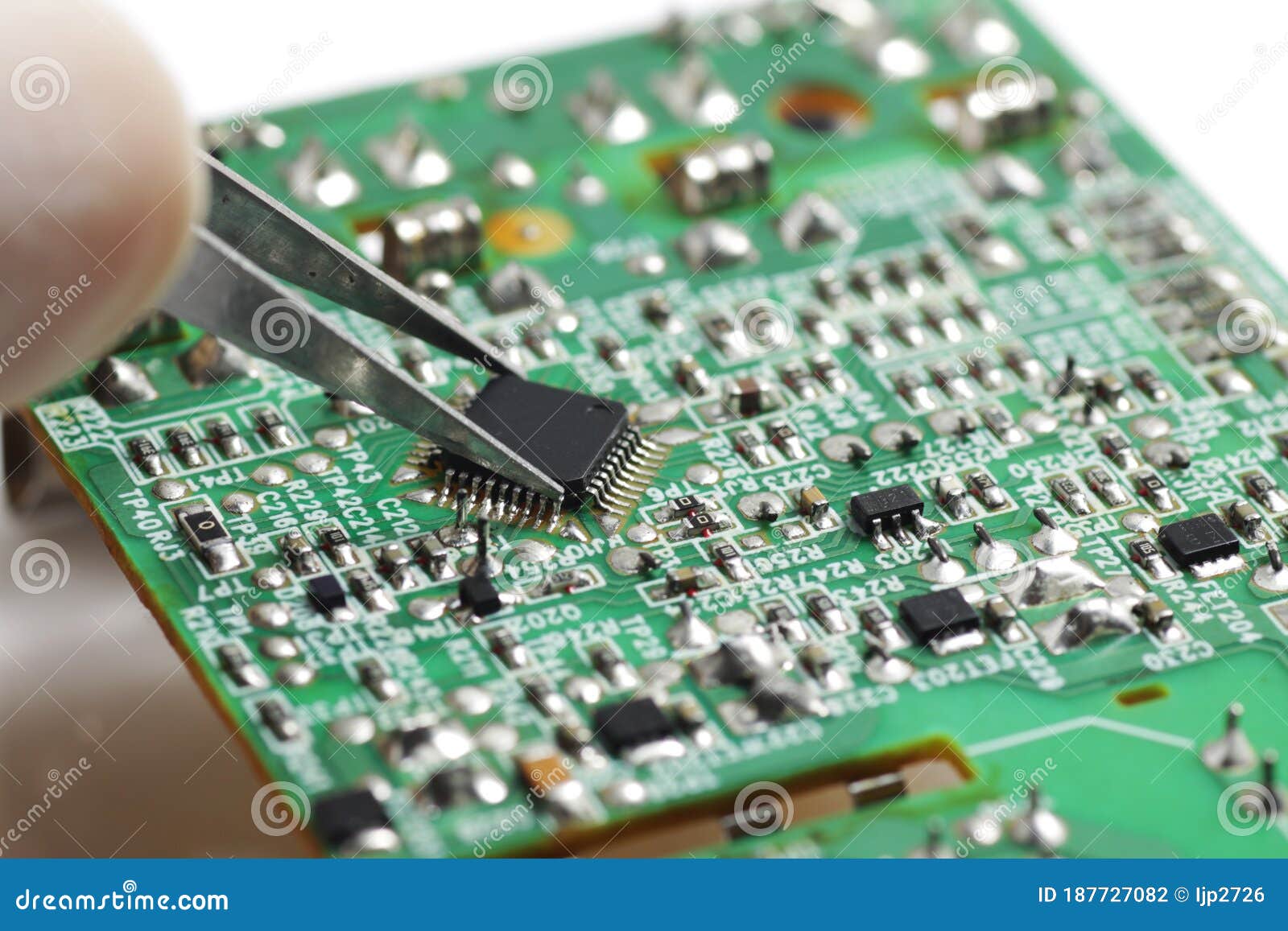 Close Up Shoot of Catching a Small Electronic Component Stock Photo ...
