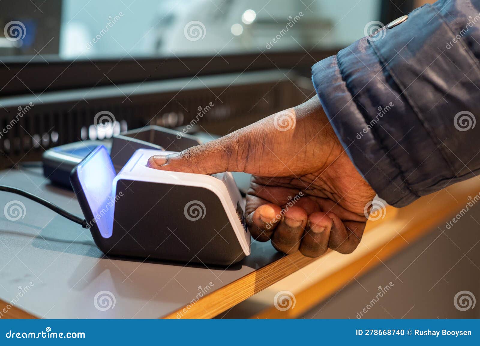 Close Up Shot of Biometrics Being Done on Persons Thumb Stock Photo ...