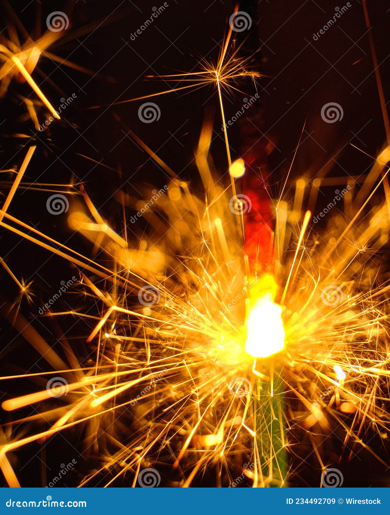 Close-up Shot of a Burning Sparkling Bright Firework Stick in the ...