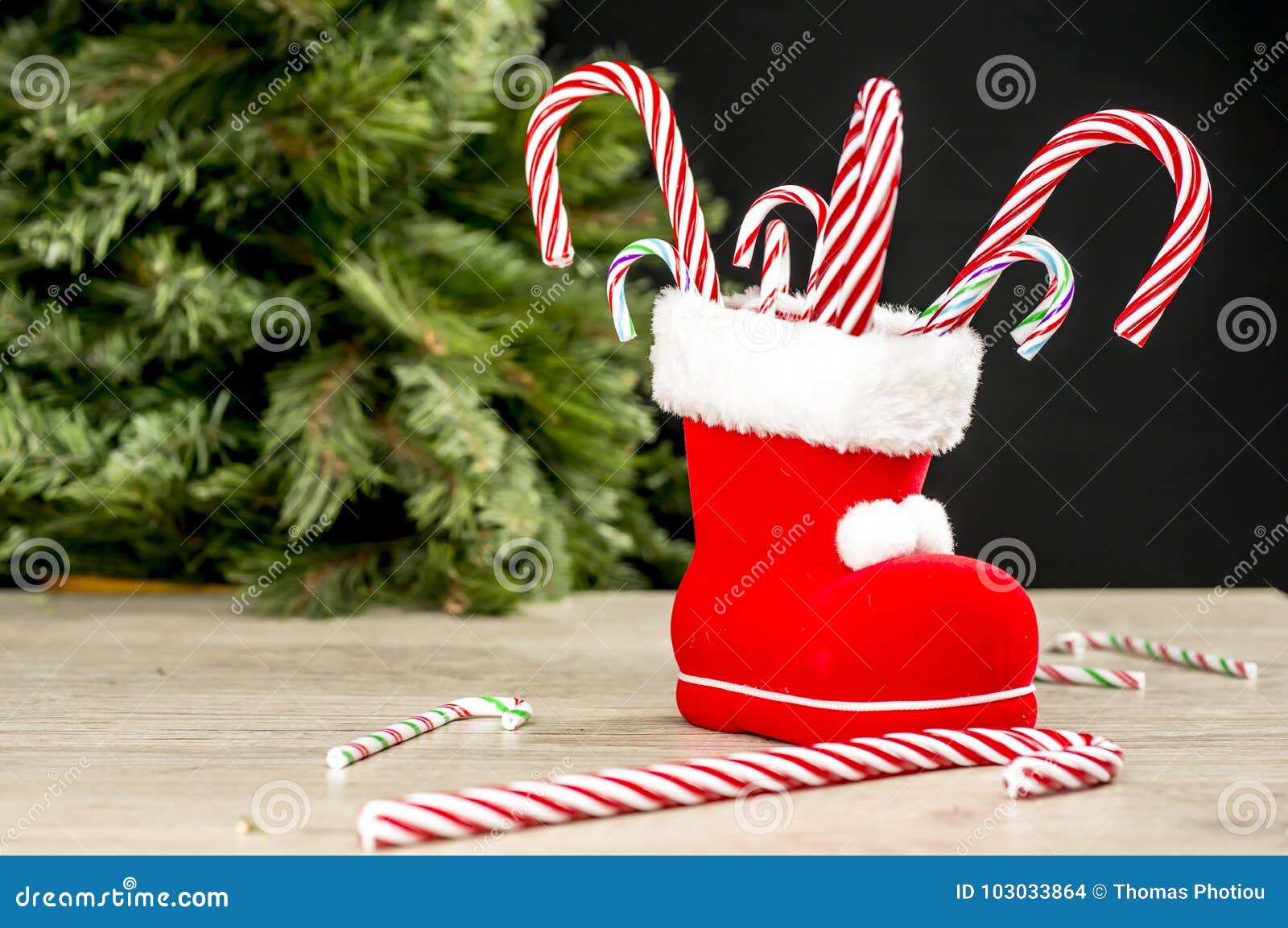 Candy Canes in Christmas Boot Stock Photo - Image of sock, santa: 103033864