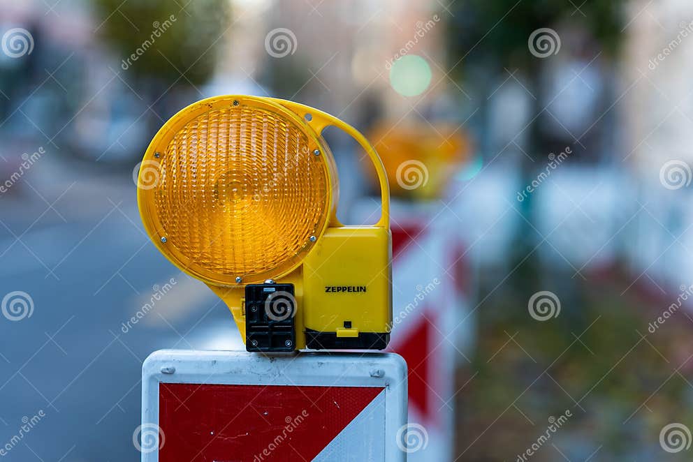 Close-up Shot of a Construction Warning Light in a Blur Editorial ...