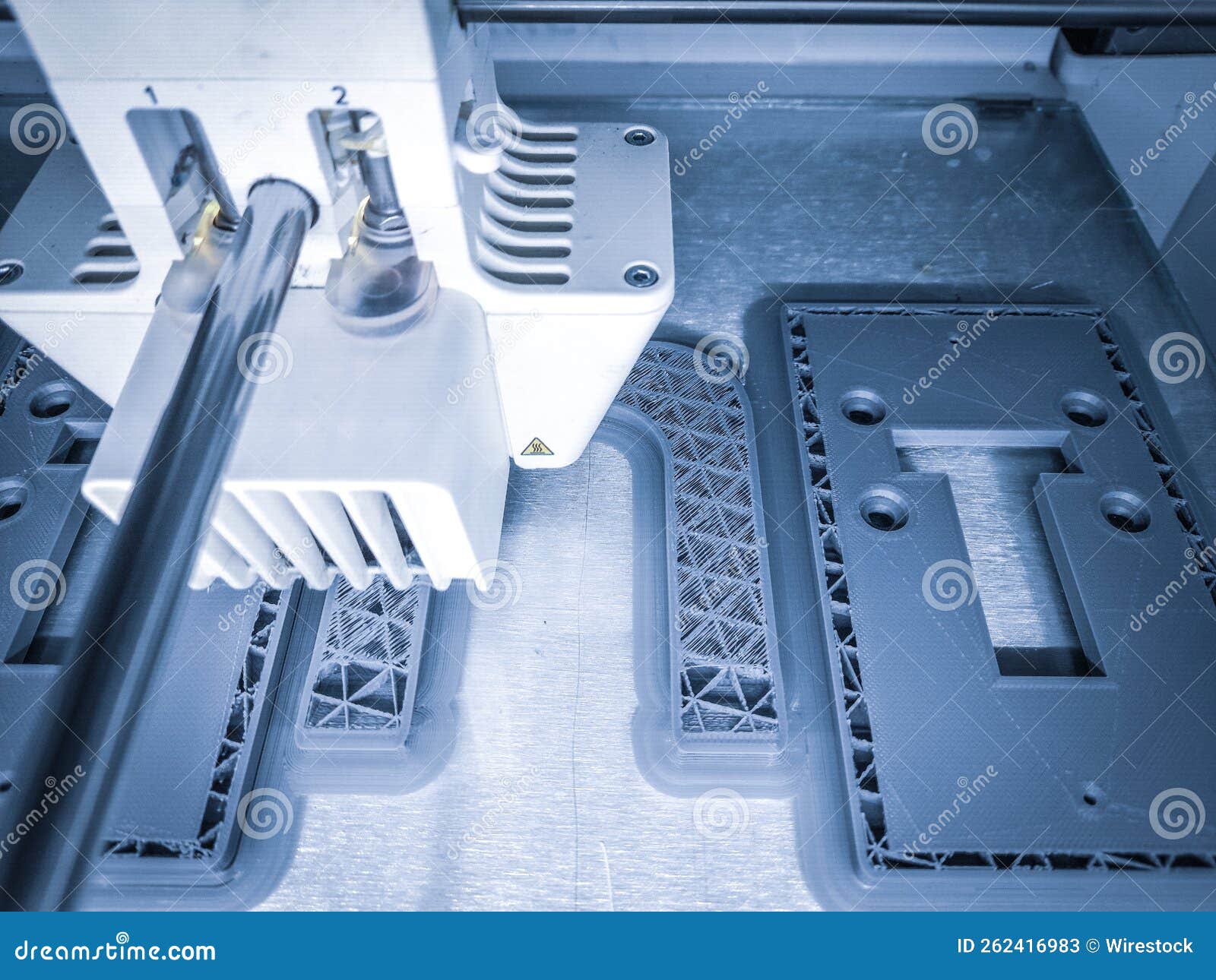 Close-up Shot of a 3D Printer with Plastic Wire Filament in Additive ...