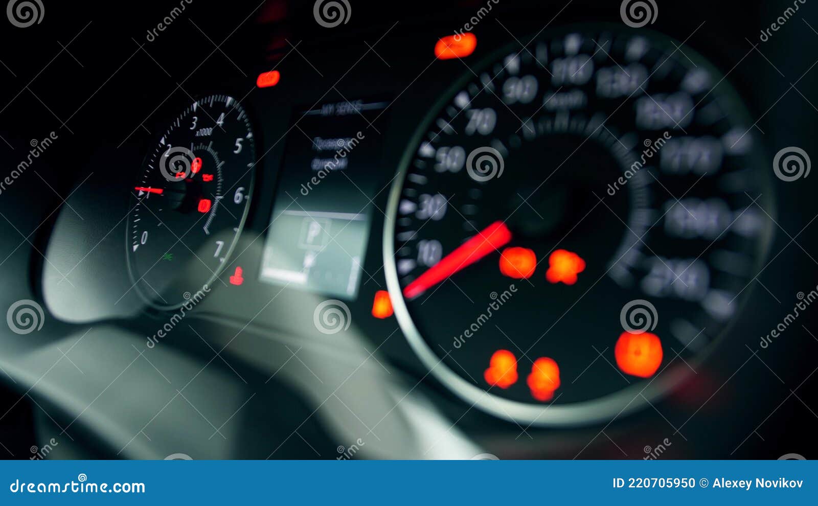 Close-up Shot of the Dashboard of a Modern Car. Turning on the Engine ...