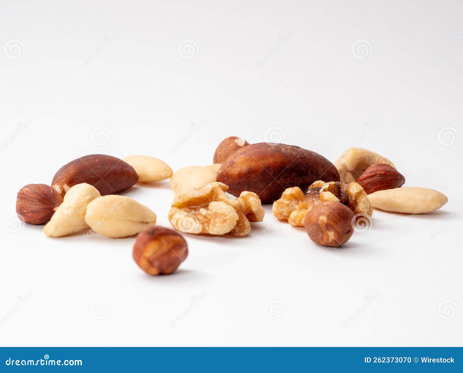 Close-up Shot of Different Kinds of Nuts on a White Surface. Stock ...
