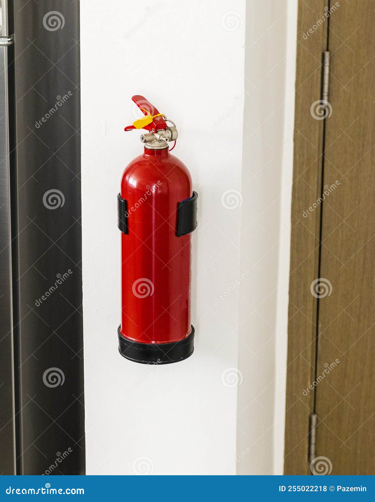 Close Up Shot of a Fire Extinguisher on the Wall. Safety Stock Photo ...