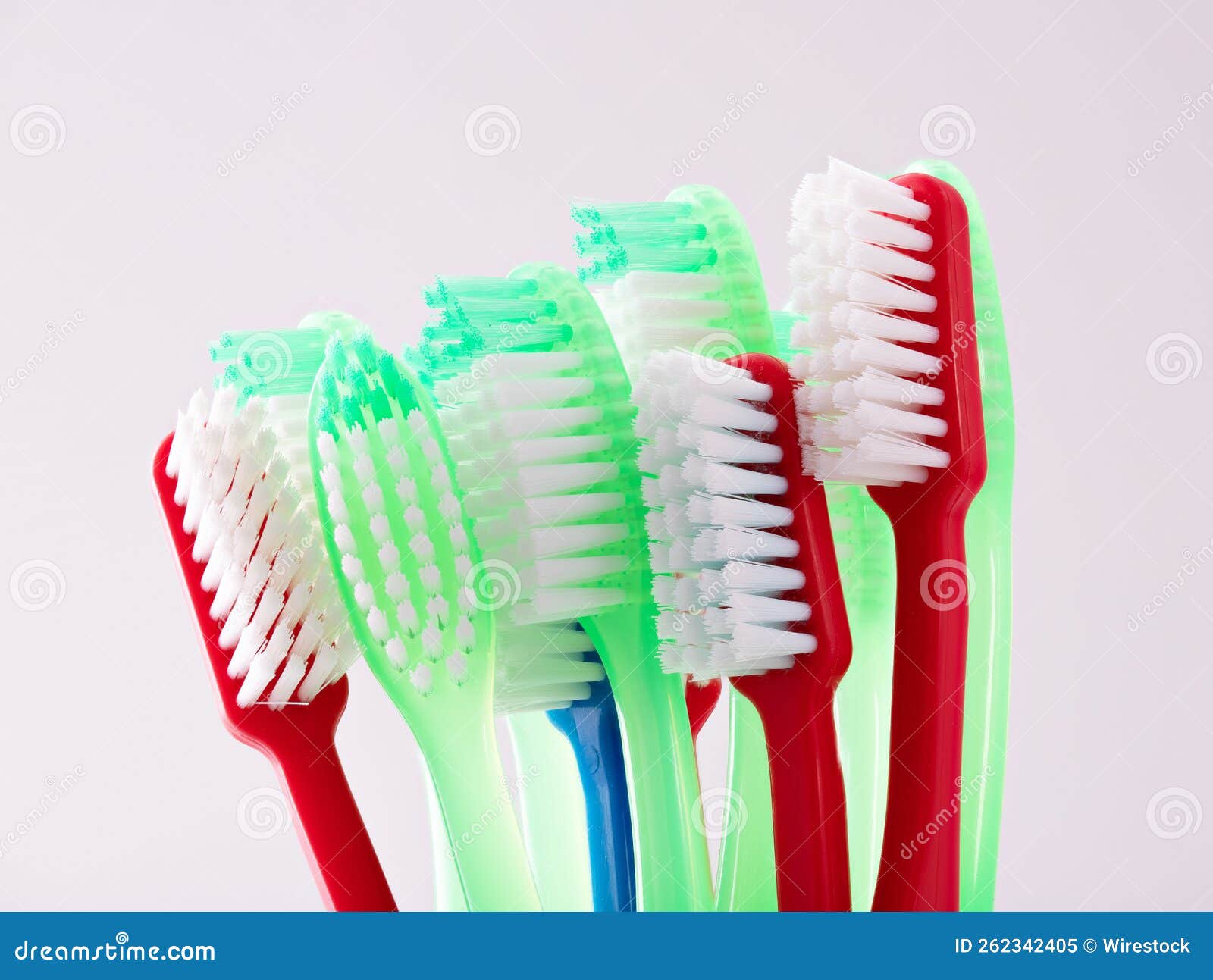 Close Up Shot of a Group of Toothbrushes Isolated on White Background ...