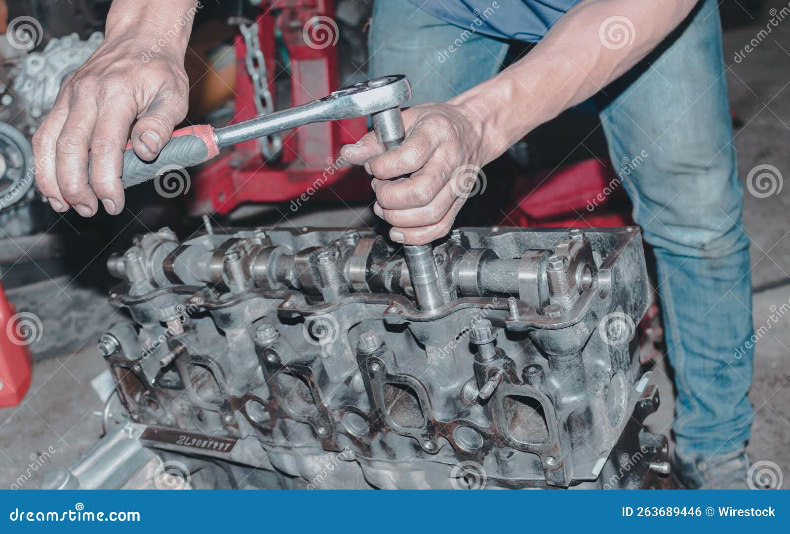 Close-up Shot of Hands Repairing a Metallic Engine Stock Photo - Image ...