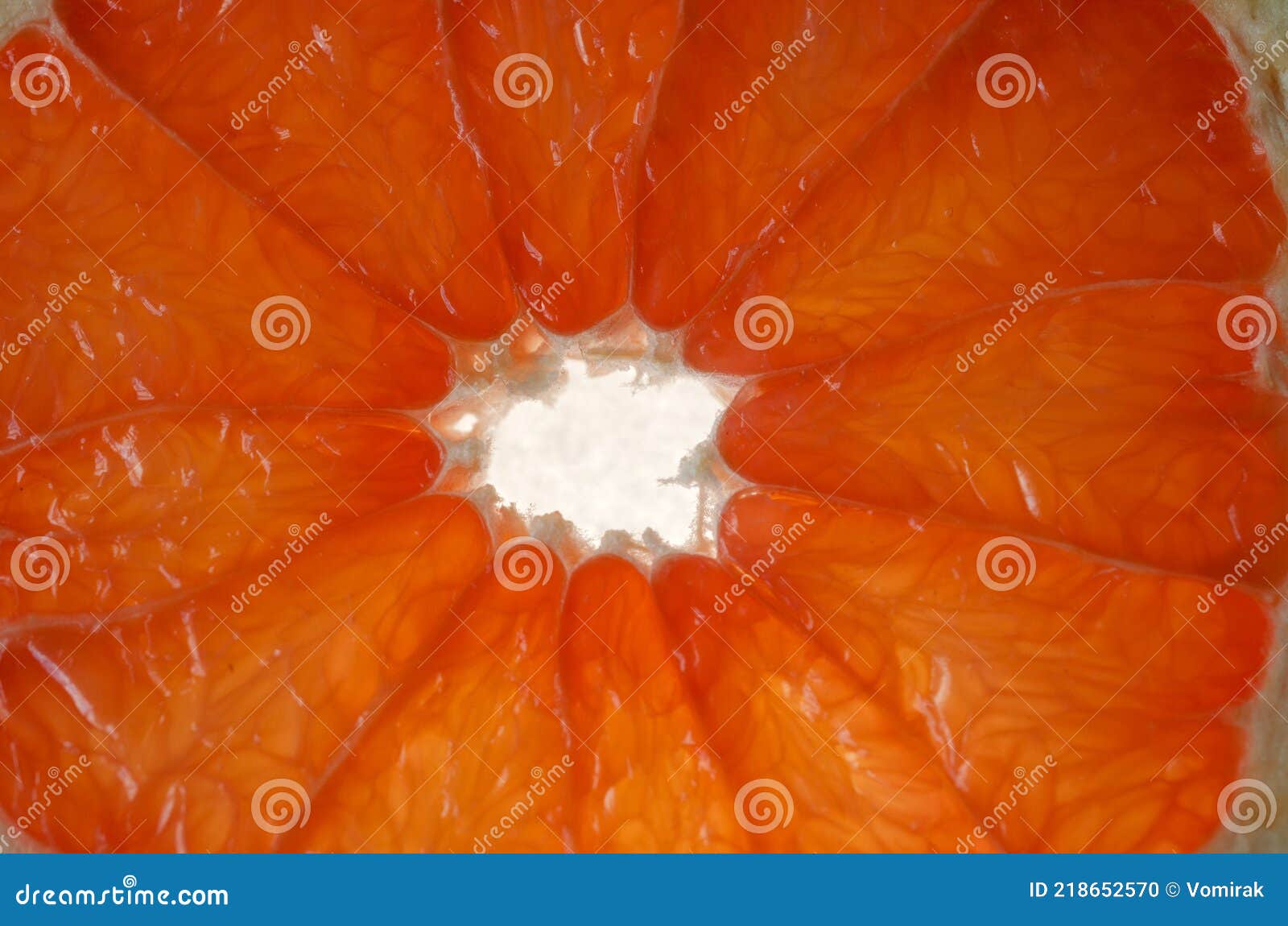 Close-up Shot of a Juicy Grapefruit Wedge Stock Photo - Image of ...