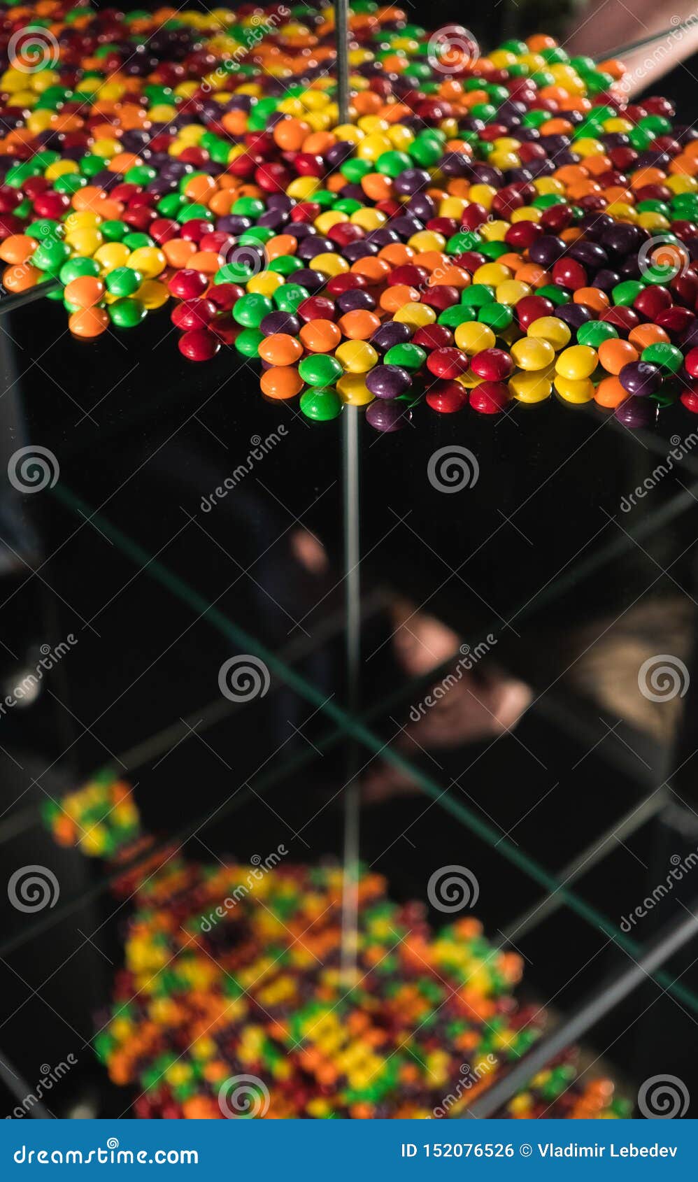 Close Up Shot of Large Group of Colorful Candys in the Mirror Cube ...