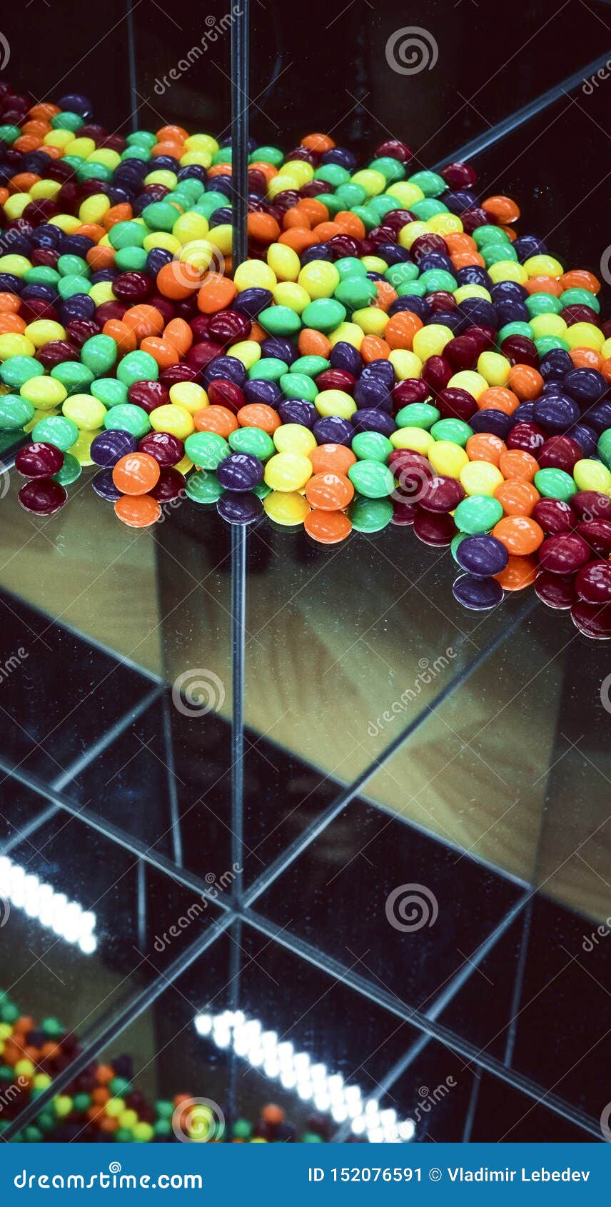 Close Up Shot of Large Group of Colorful Candys in the Mirror Cube ...