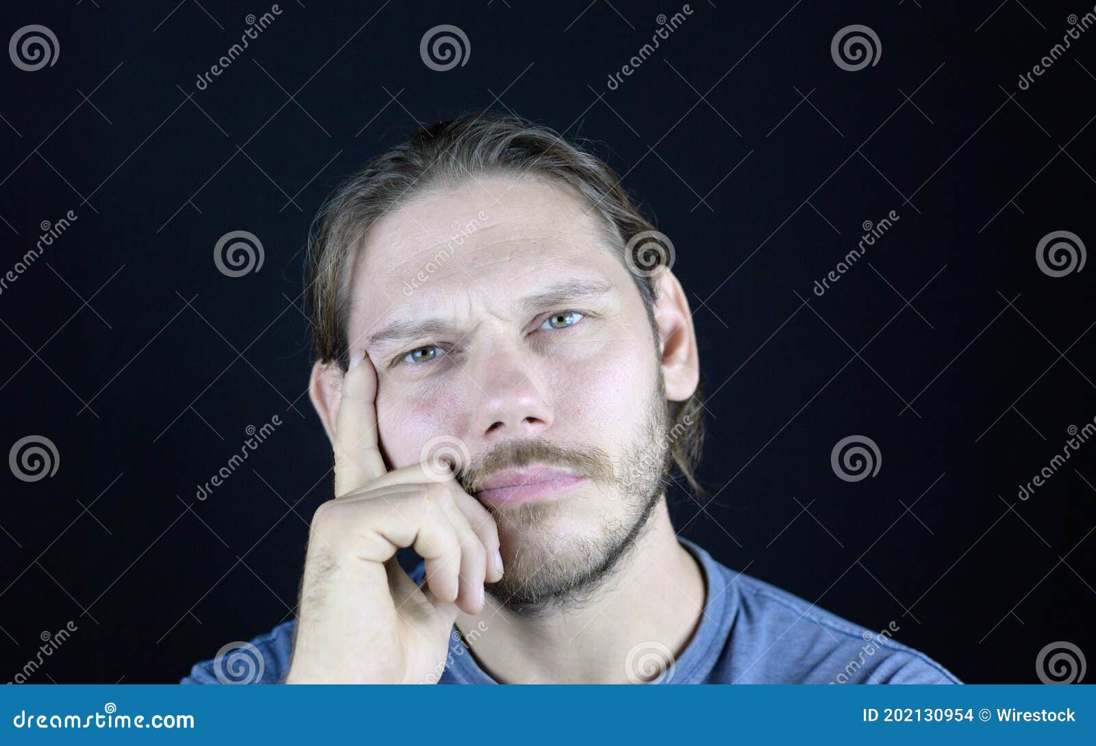 Close-up Shot of a Male Making a Thinking Face Stock Photo - Image of ...