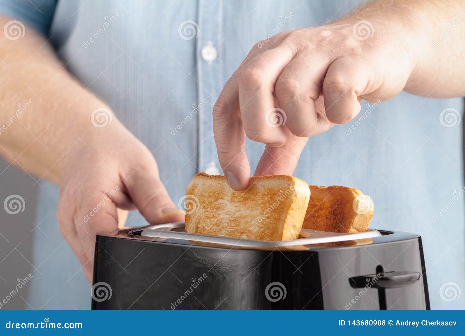 Close-up Shot of Man Taking Toast from Toaster Stock Photo - Image of ...