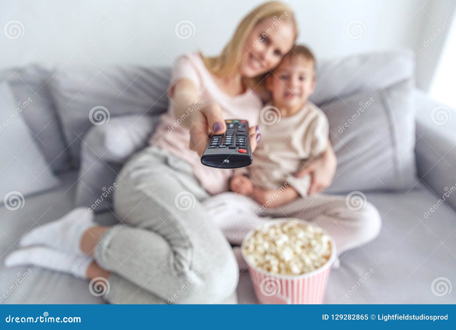 Close-up Shot of Mother and Son Using Remote Control Stock Image ...