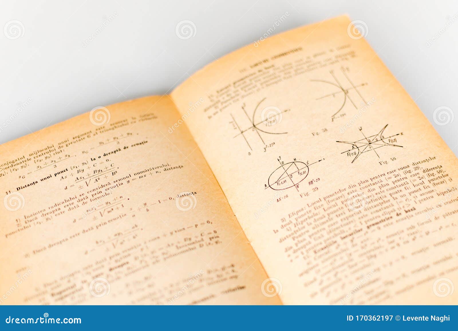 Close Up Shot of an Open Old Science Book Containing Equations and ...