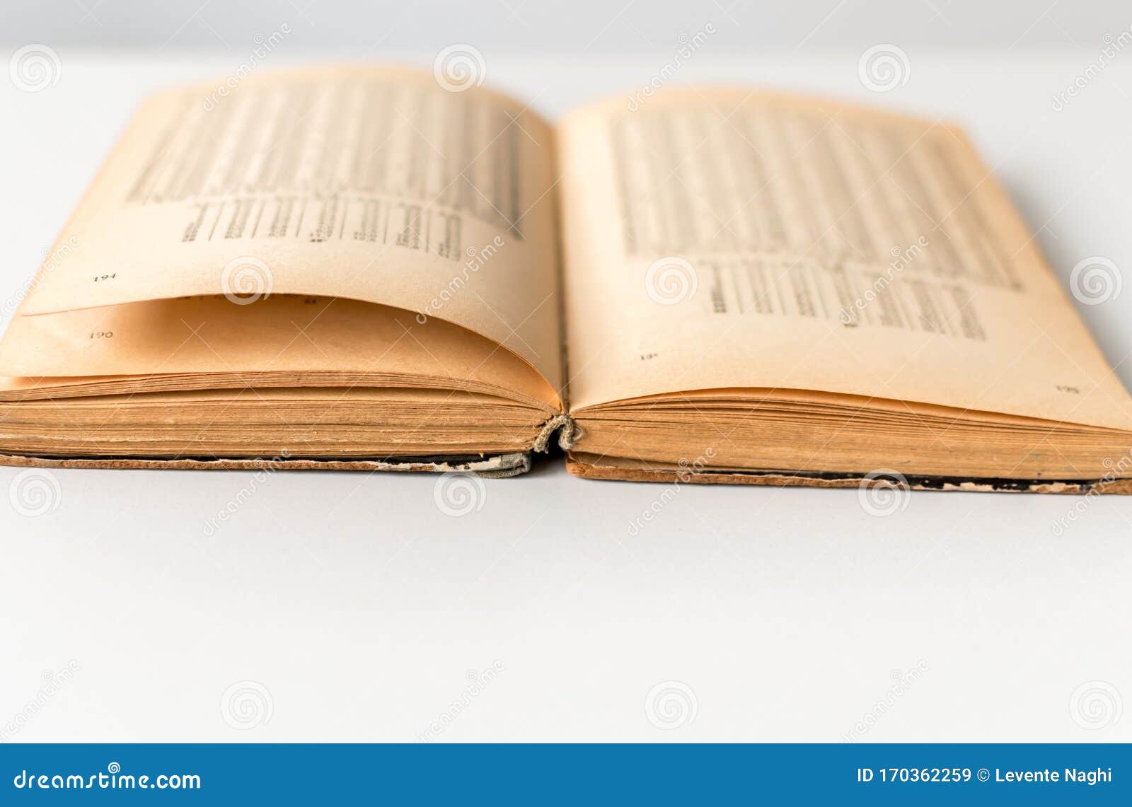 Close Up Shot of an Open Old Science Book Containing Equations and ...